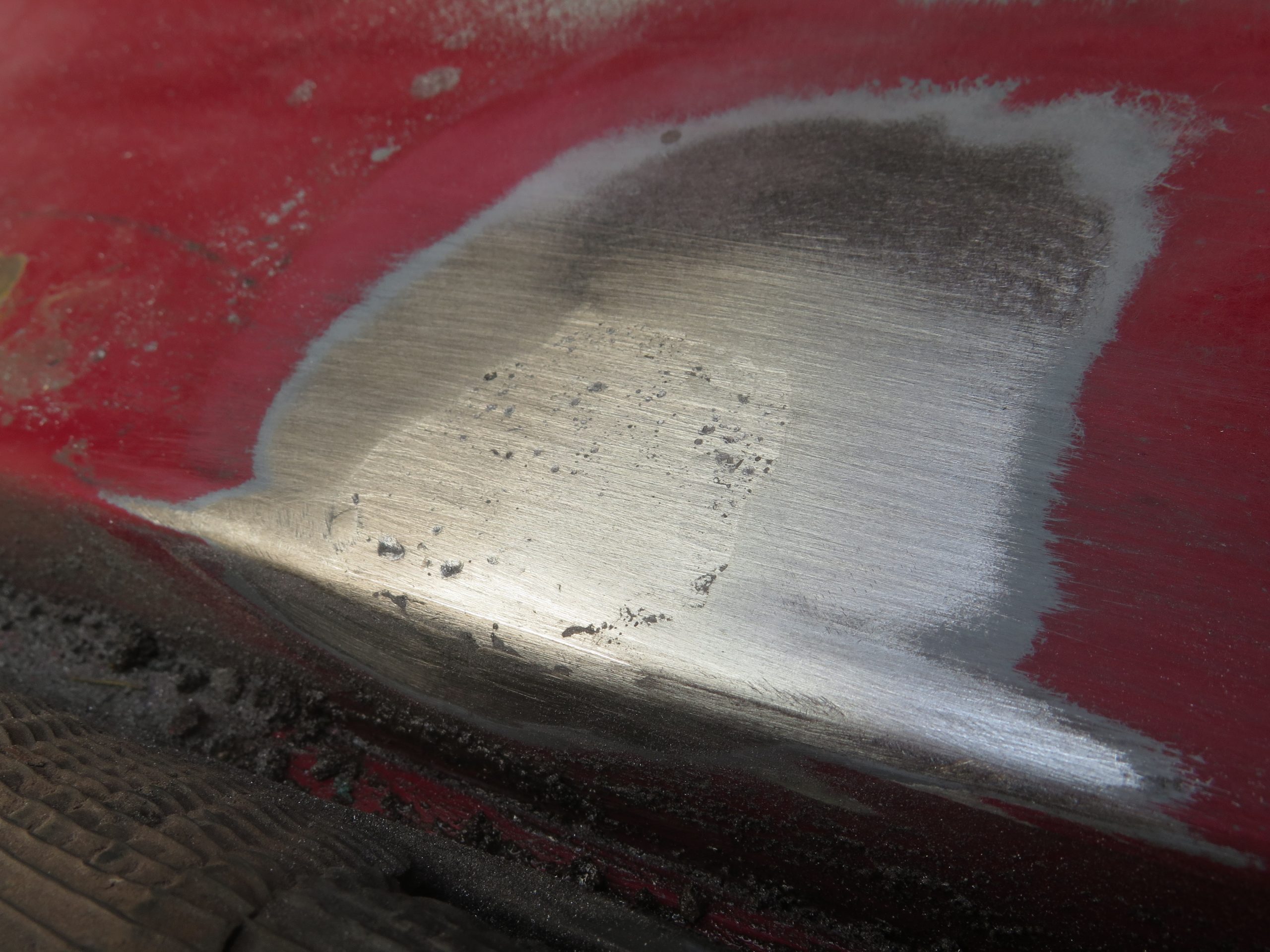 AUTOBODY WORK: solder better than bondo for permanently filling holes